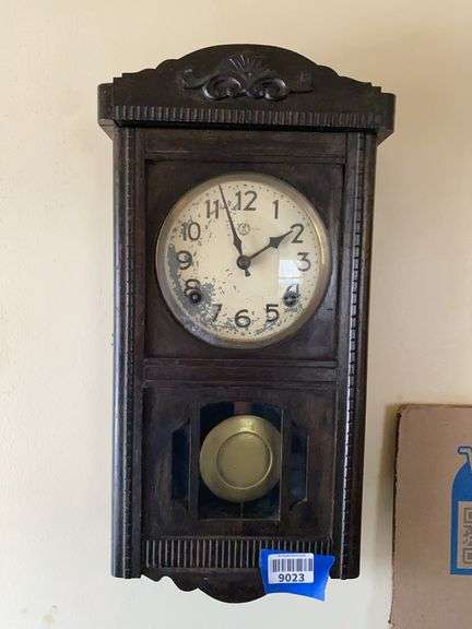 SK/Trade Mark wall clock w/ applied carving - Hurley Real Estate & Auctions
