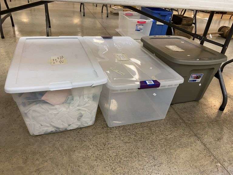 Three plastic storage totes, towels - Hurley Real Estate & Auctions