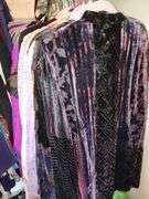 Rack full of clothes on the right side of closet - Innovative Revenue ...
