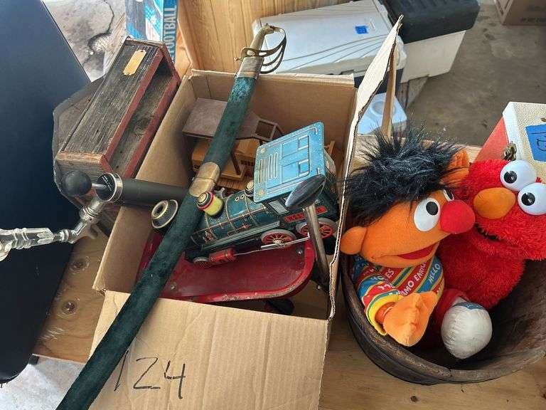 Toys, Sword, & Beer Tap - Integrity Auctioneers
