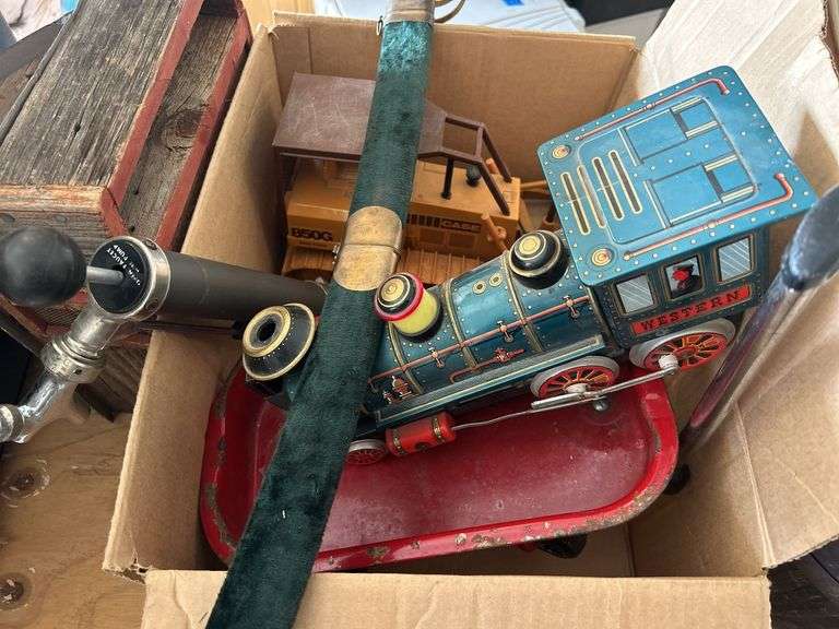 Toys, Sword, & Beer Tap - Integrity Auctioneers