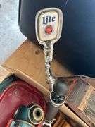 Toys, Sword, & Beer Tap - Integrity Auctioneers