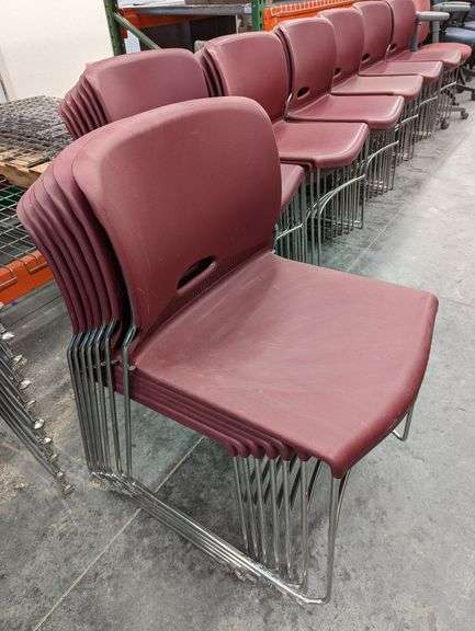 STACK OF (7) MAROON STACKING CHAIRS - Isabell Auction