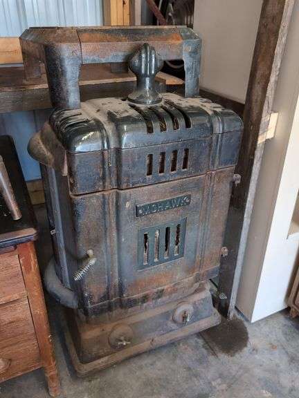 VINTAGE MOHAWK 55" TALL CAST IRON WOOD BURNING STOVE - Isabell Auction