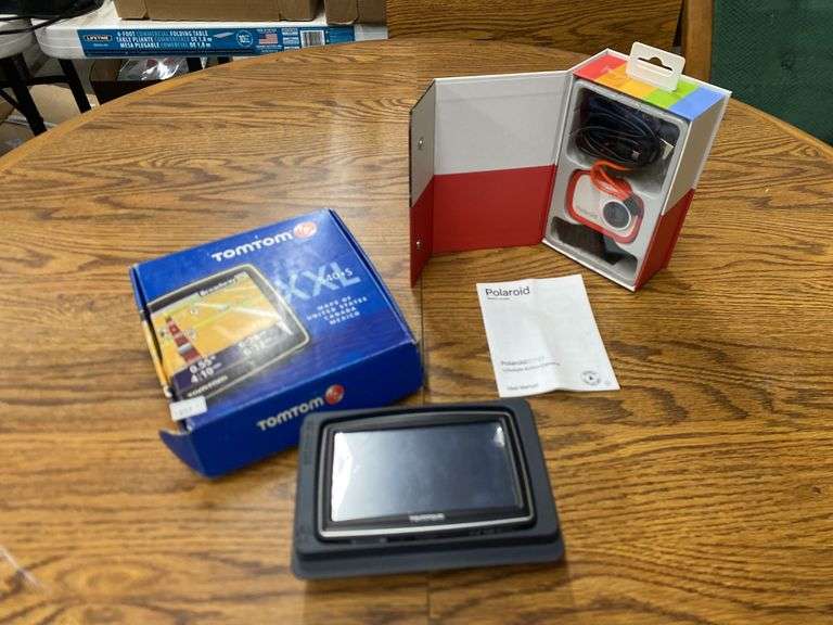 POLAROID ACTION CAMERA, AND TOMTOM CAR NAVIGATION DEVICE - Isabell Auction