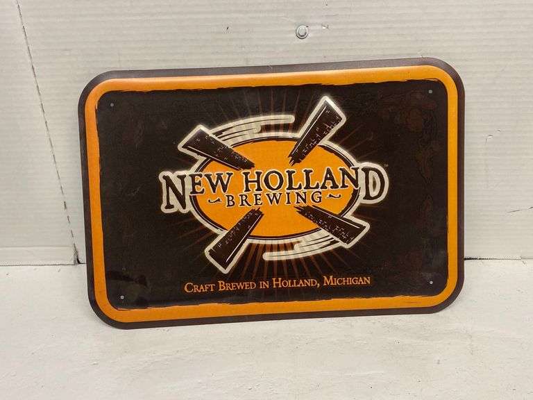 15” x 10 1/2” NEW HOLLAND SIGN - Isabell Auction