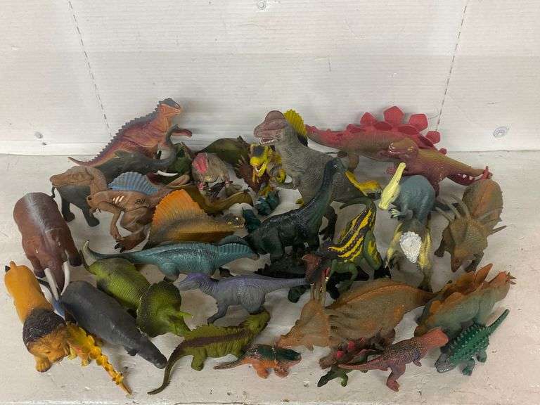 ASSORTED DINOSAURS TOYS - Isabell Auction