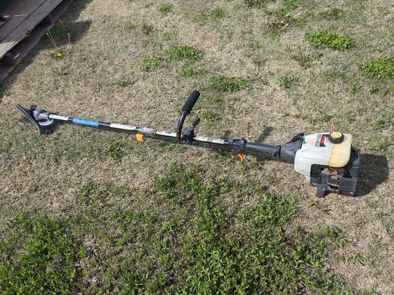 (OUT) RYOBI GAS TRIMMER (TURNS OVER) - Isabell Auction