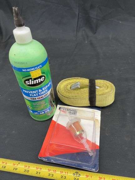 TIRE SLIME, STRAP AND FUEL FILTER - Isabell Auction