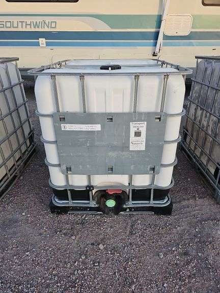 (OB) 250 GALLON POLY TANK W/VALVE - Isabell Auction