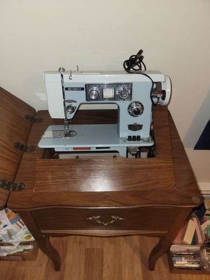 (LB) DELUXE PUSH BUTTON SEWING MACHINE AND CABINET - Isabell Auction