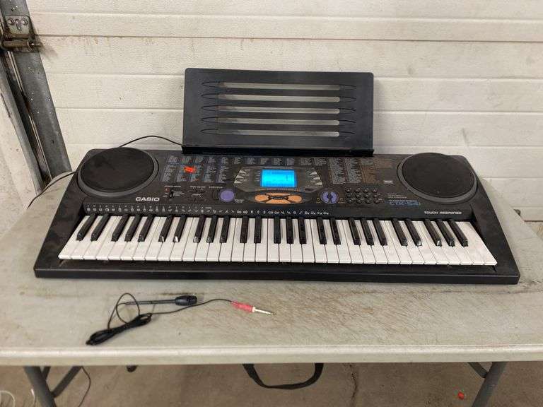 CASIO ELECTRIC STAGE PIANO WITH MICROPHONE - Isabell Auction