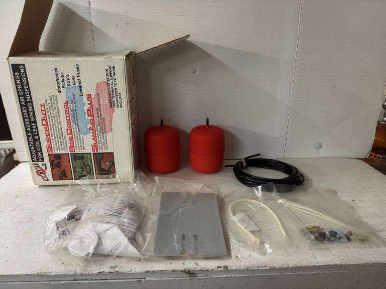 ADJUSTABLE AUXILIARY AIR SPRINGS FOR COIL AND LEAF SPRING SUSPENSIONS ...