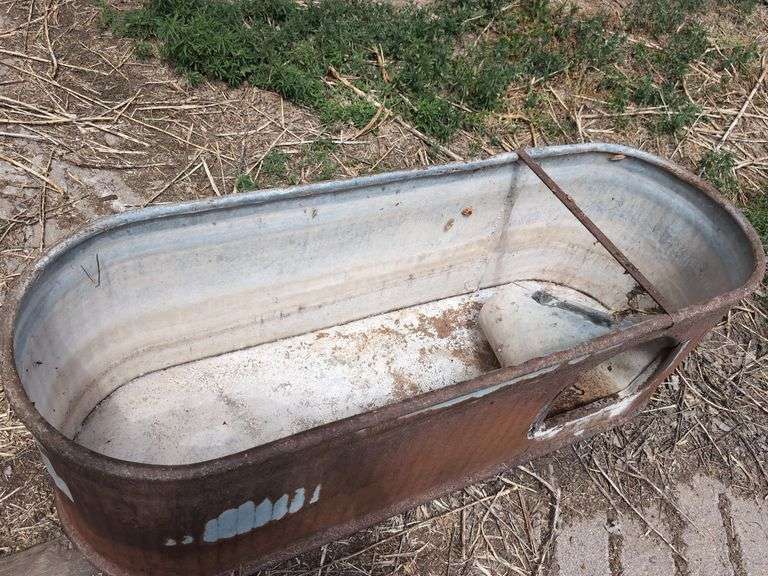 (OUT) 7-FT. STOCK TANK WITH DRINKER (RUST) - Isabell Auction