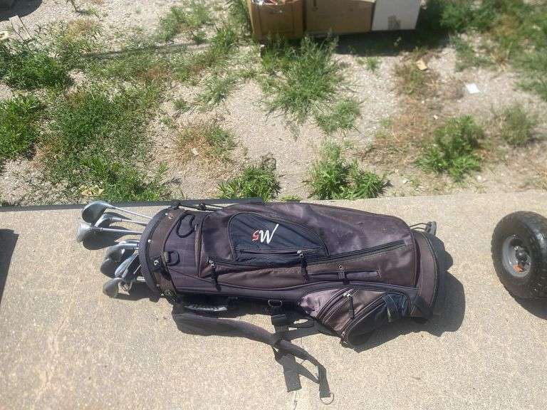 (OUT) GOLF BAG WITH CLUBS - Isabell Auction