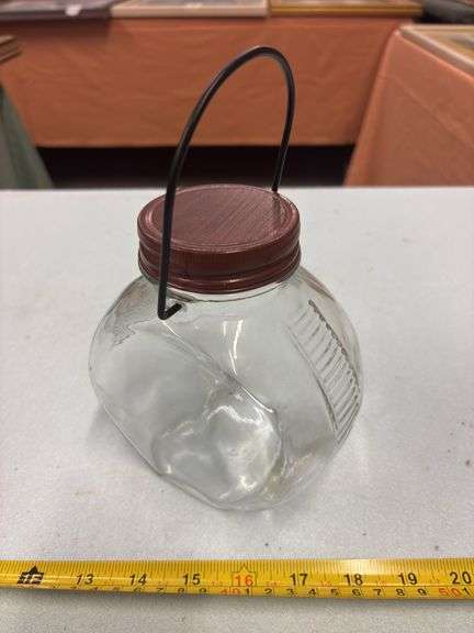 VINTAGE 6”T JAR WITH WIRE HANDLE - Isabell Auction
