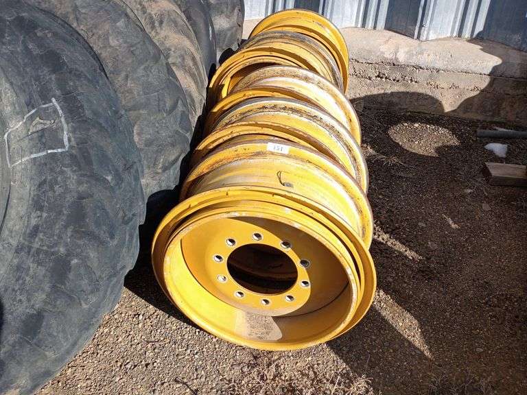 Qty 5 used cat rims Raton NM - J&J Auctioneers LLC