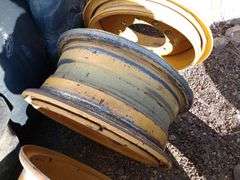Qty 5 used cat rims Raton NM - J&J Auctioneers LLC