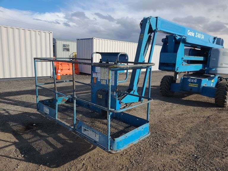 2011 Genie Z60/34 60ft Articulated Boomlift - J&J Auctioneers LLC