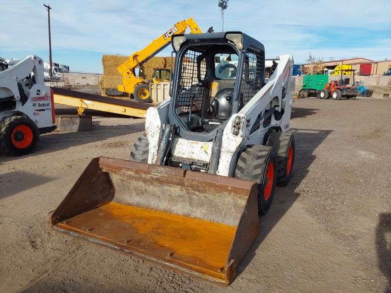 2015 Bobcat S750 Skid Steer Loader - J&J Auctioneers LLC