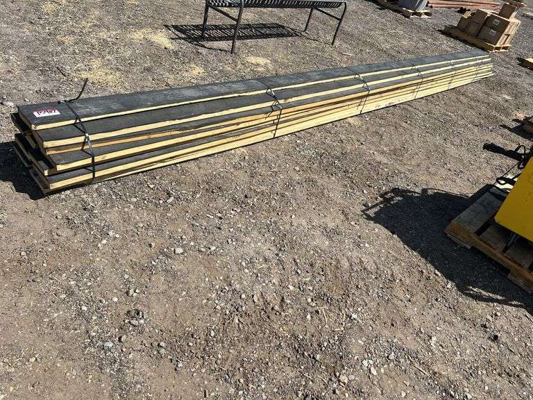 Bundle 20ft 2x8in Rubber Sided Wood - J&J Auctioneers LLC