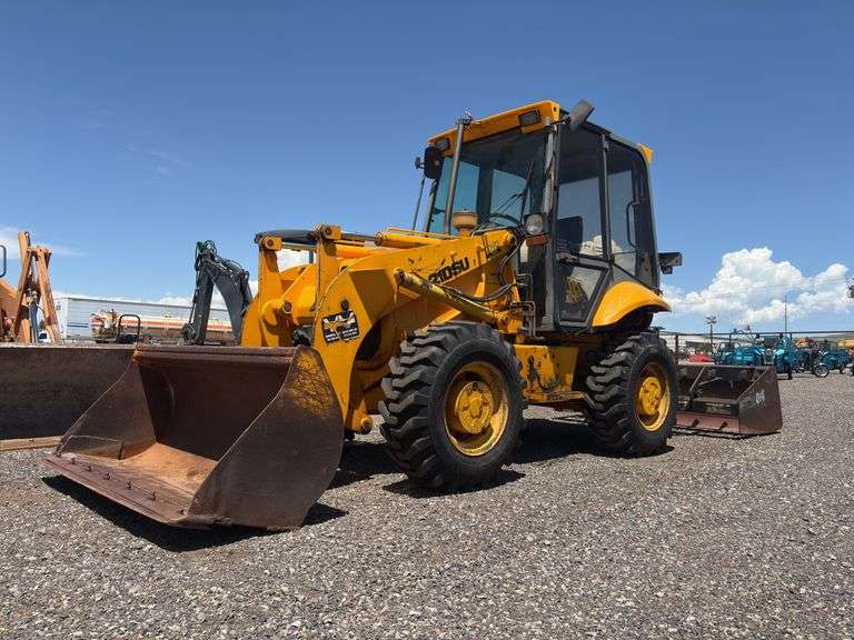 JCB 210SU 4x4 Skip Loader w/Gannon Box - J&J Auctioneers LLC