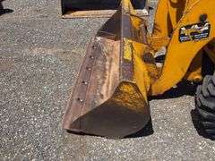 JCB 210SU 4x4 Skip Loader w/Gannon Box - J&J Auctioneers LLC