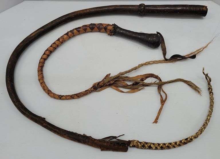 (S) Two Vintage Brown Leather Whips - Kraft Auction Service, LLC