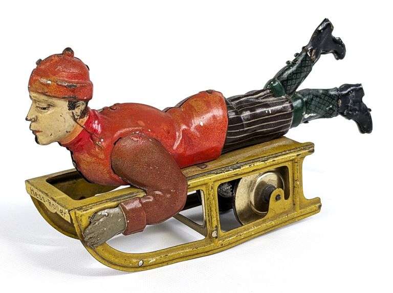 German Hess Roller Tin Boy On Sled w/ Flywheel - Kraft Auction Service, LLC