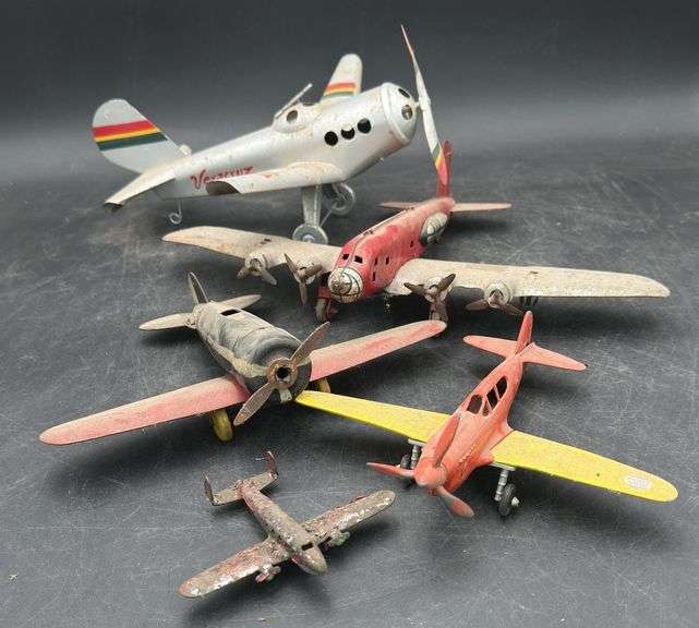 (N) Pressed Metal Toy Airplanes Includes - Kraft Auction Service, LLC