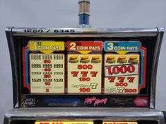 (L) Sizzling 7 Slot Machine - Kraft Auction Service, LLC