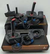 (I) Atari Game System. Games, Joysticks and Instructions. - Kraft Auction Service, LLC