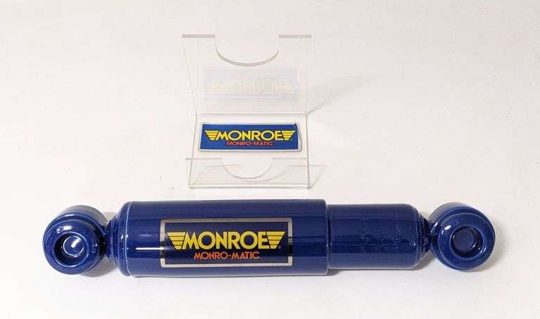 Vintage Ceramic Monroe Shock Store Display - Kraft Auction Service, LLC