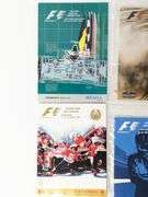 (7) Formula 1 Racing Programs - Kraft Auction Service, LLC