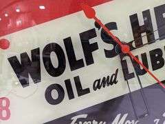 Reproduction Pam Wolf's Head Oil Lighted Clock - Kraft Auction Service, LLC