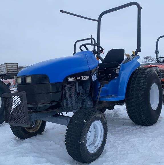 New Holland TC29 Utility Tractor - Kraft Auction Service, LLC