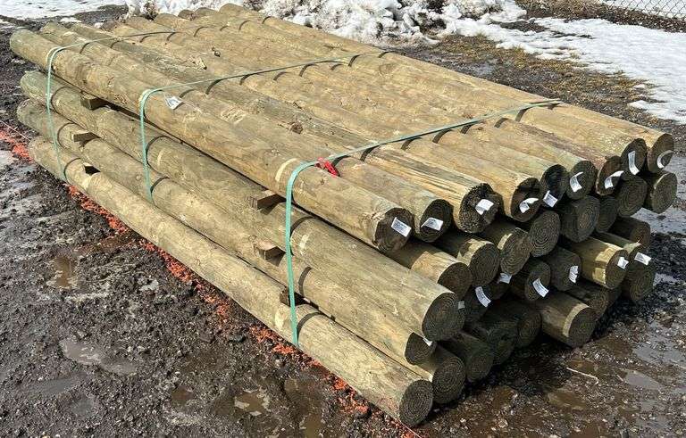 4" x 8' Treated Posts, 36 Posts - Kraft Auction Service, LLC