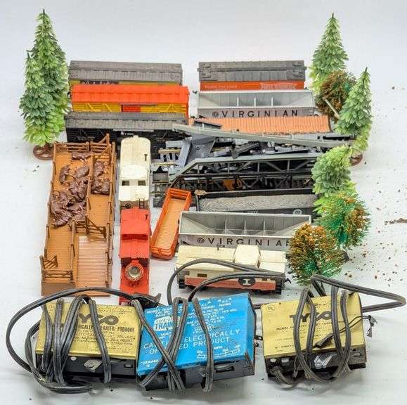 (F) Model railroad cars, trees and power supplies. Longest piece is 9 ...