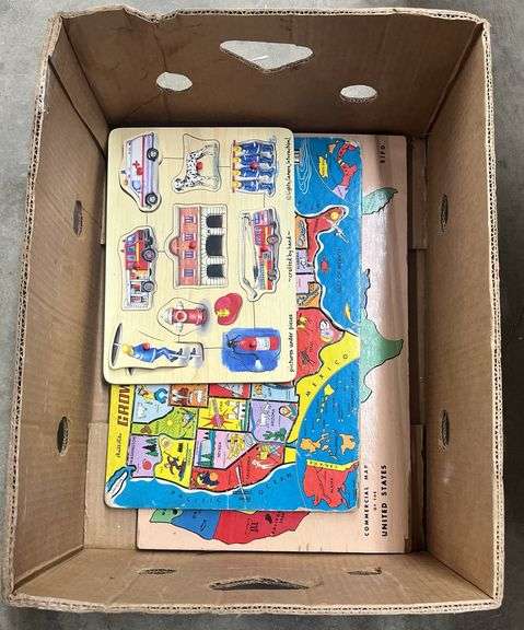 (AA) Cardboard Crate Of Children’s Puzzles - Kraft Auction Service, LLC