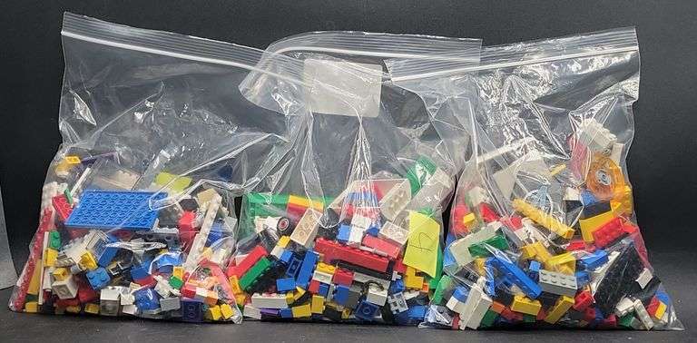 (UU) Three Bags Of Assorted Plastic Legos - Kraft Auction Service, LLC