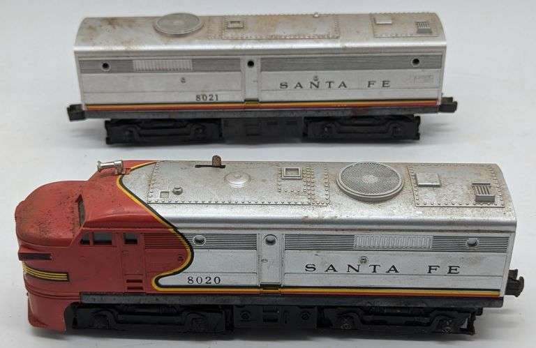 (F) Santa Fe model train engine and car by Lionel. Longest car is 10 ...
