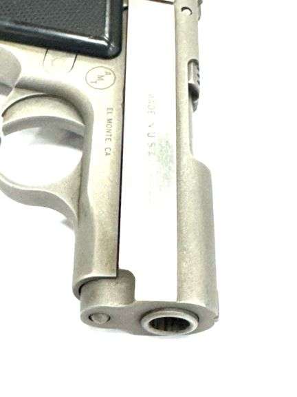 AMT Backup .380 Caliber Semi-Auto Pistol in Holster - Kraft Auction ...