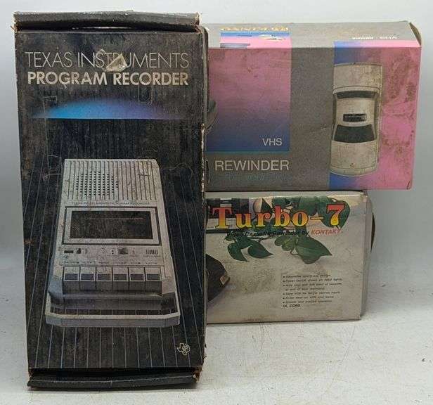 (F) Texas Instruments audio cassette recorder, and two VHS rewinders ...