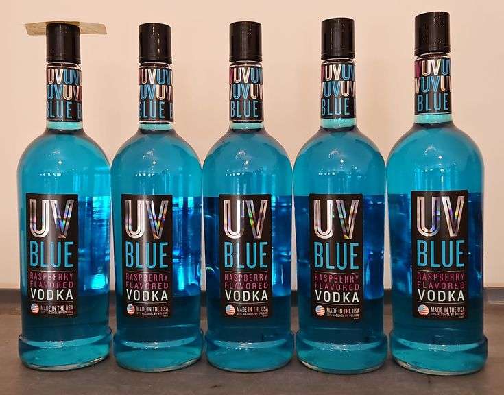 UV Blue Raspberry Flavored Vodka Bottles - Kraft Auction Service, LLC