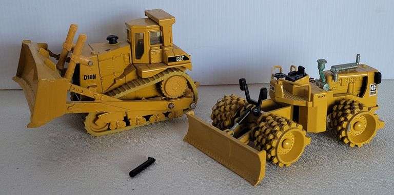 Two Caterpillar Models Includes D10N Tractor With Tracks And 825B Soul ...