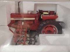 Spec Cast Die-Cast IH Farmall Tractor Model - Kraft Auction Service, LLC