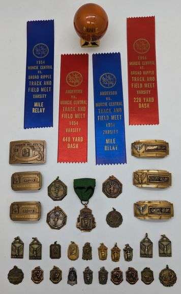 (L) Track and Field ribbons, medals, and belt buckles from the 1950's ...