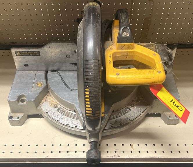 DeWalt DW705 12” Compound Miter Saw. - Kraft Auction Service, LLC