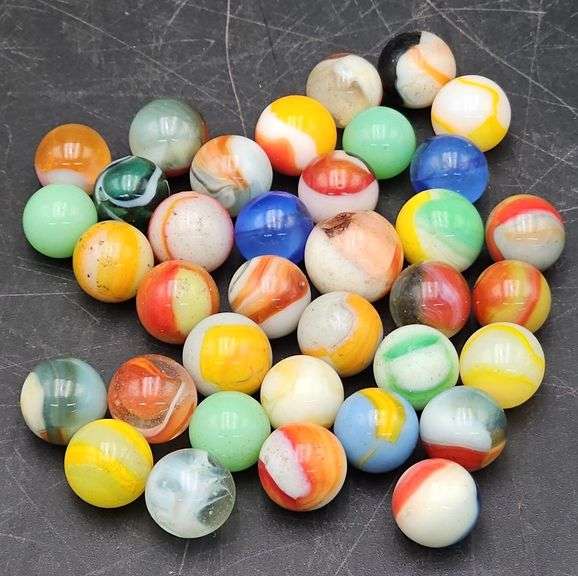 (AD) UV Reactive Marbles - Kraft Auction Service, LLC