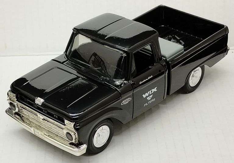 (I) Die cast 1966 Ford F-100 truck bank (8" long). Four identical banks ...